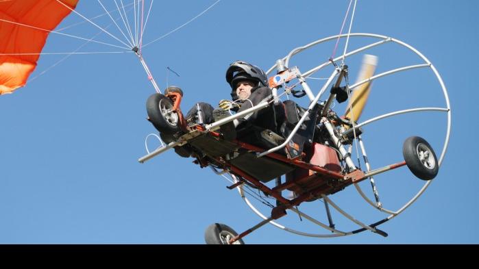 Flying machine: Man uses powered parachute to soar above Bitterroot ...