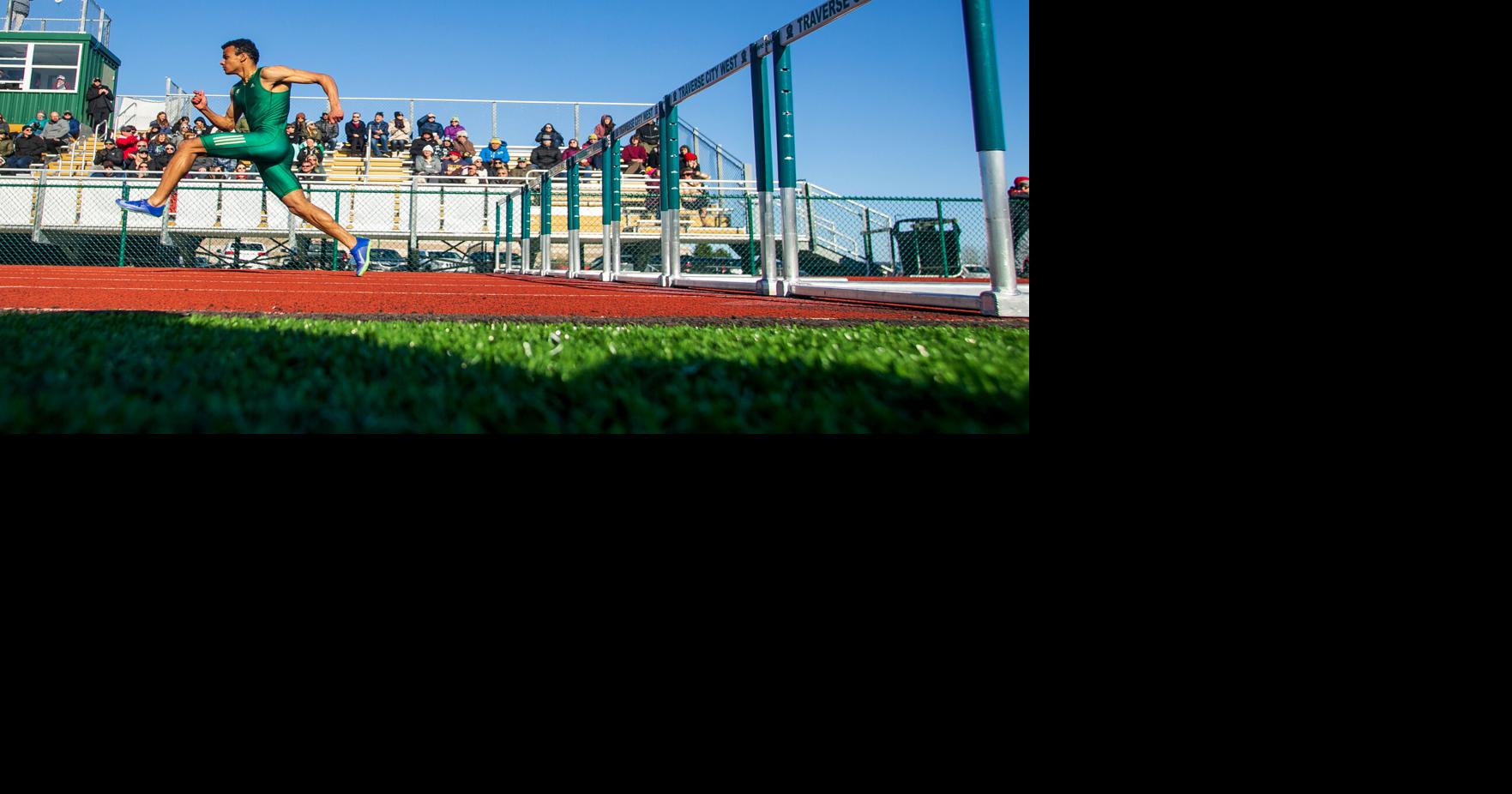 Track & Field Roundup: Titans, Trojans battle it out on the track ...