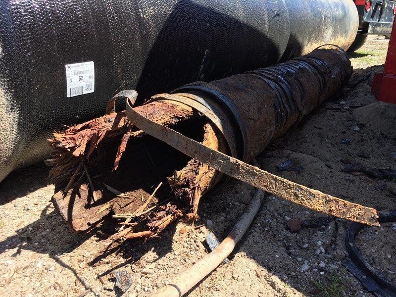 Wooden water main uncovered in Eighth Street construction | Local News ...