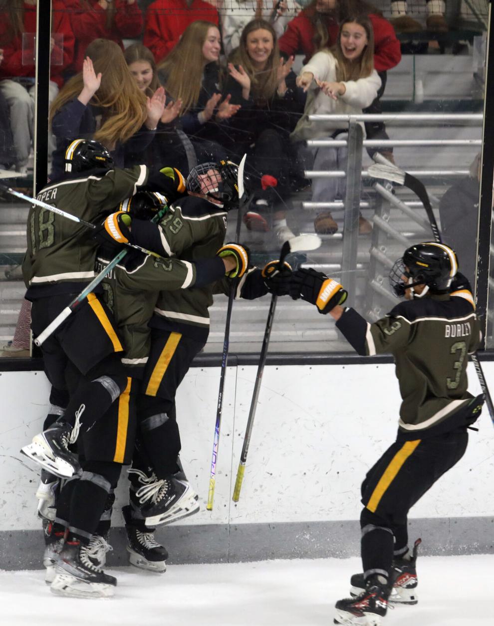 Prep roundup: Trojans double up Sparta; Peters scores 100th point ...