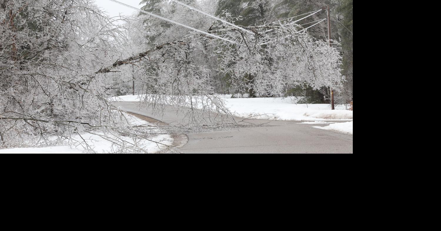 Ice storm slaps region: Trees snap, power lines fall, emergency center ...