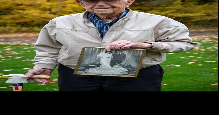 A profile of courage: World War II veteran Ray Weber, 102, recounts a ...
