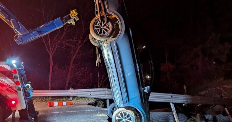 OVER THE EDGE: Driver crashes through Beitner Road barricade | Local ...