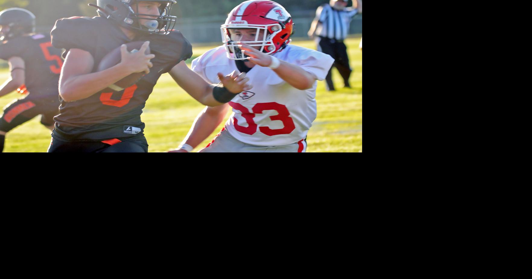 Prep Roundup: Naumcheff goes off for 6 TDs as Mancelona routs Tawas, 52 ...