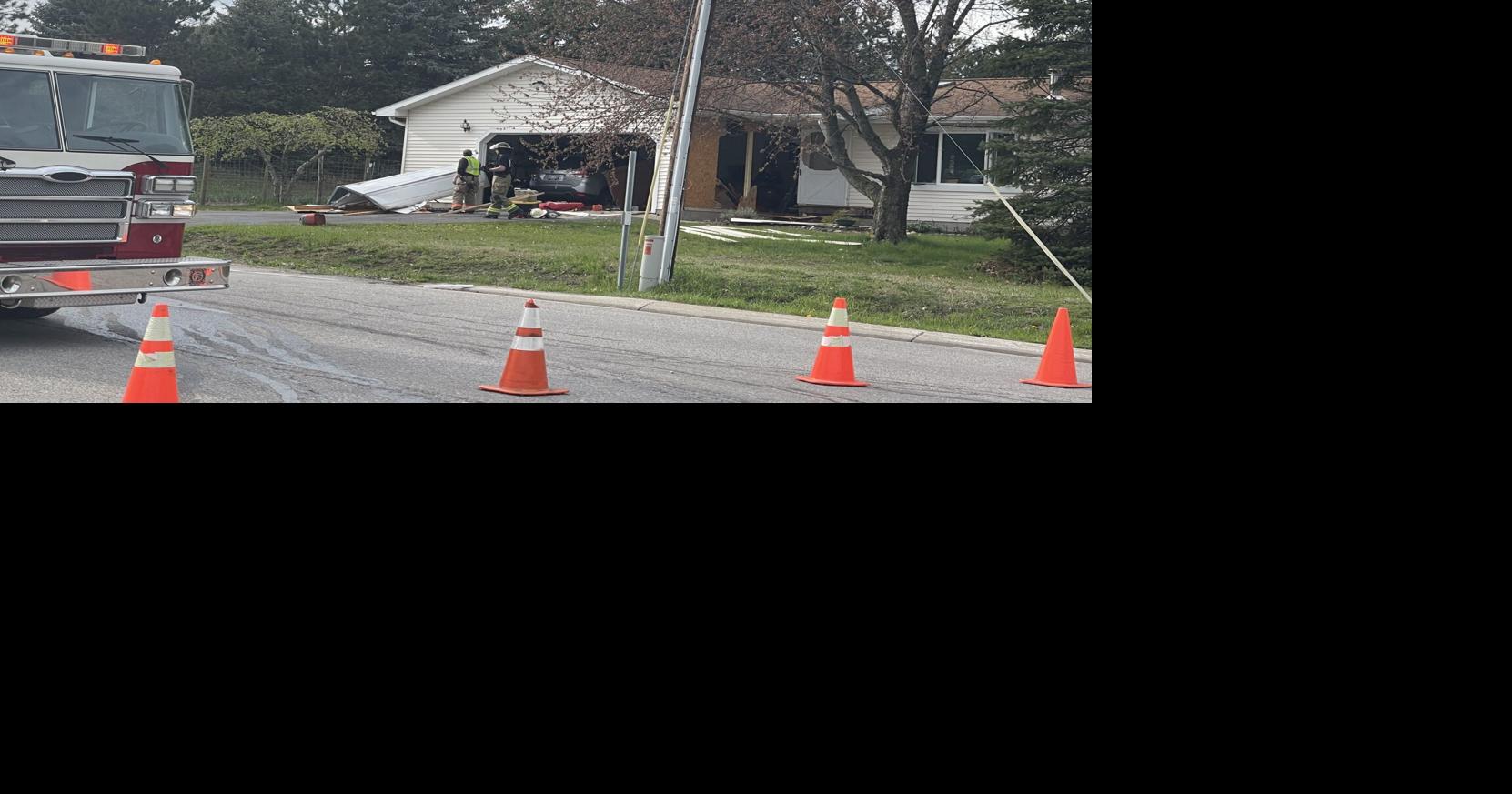 Car crashes through side of garage; no injuries | Local News | record ...