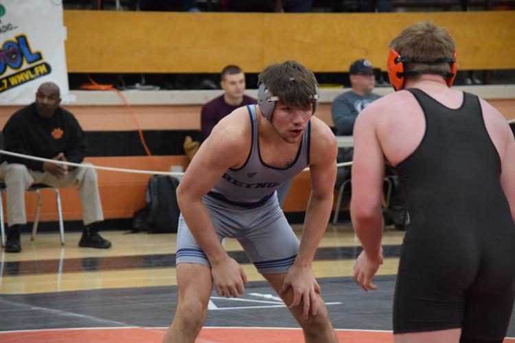 Reynolds dominates as they claim 22nd District 10 team wrestling title ...