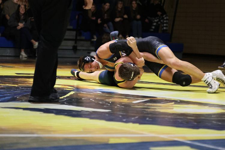 Hunter Cox eclipses century mark on the mats as a junior | Sports ...