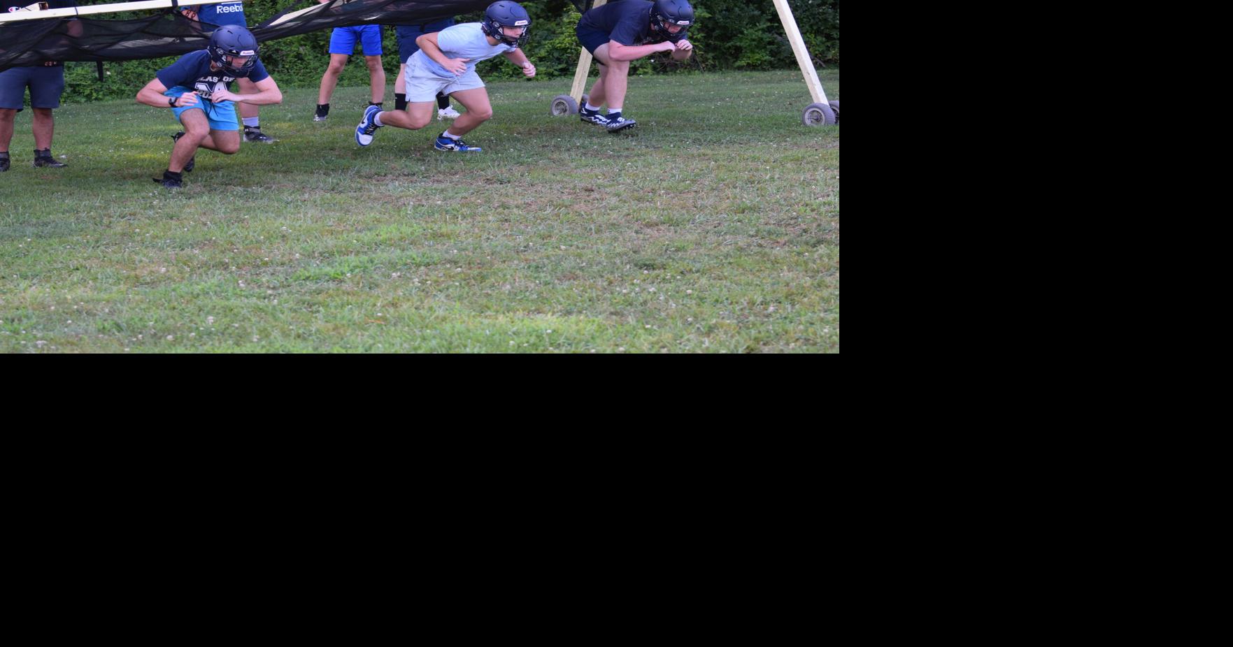 Mercer linemen work the step trainer at Mercer High School | Sports ...