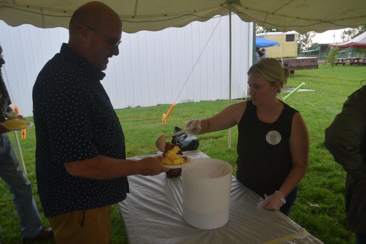 Rain can't keep them away from Guernsey ice cream social | News ...