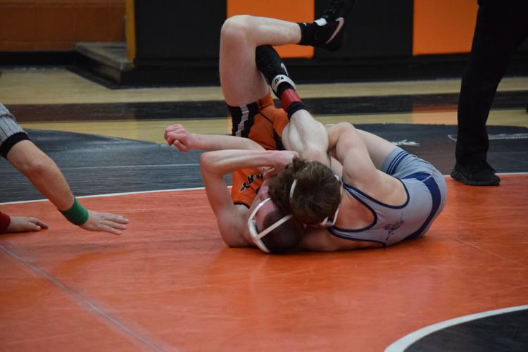 Reynolds dominates as they claim 22nd District 10 team wrestling title ...
