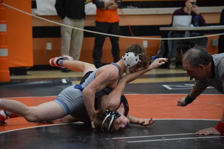 Reynolds dominates as they claim 22nd District 10 team wrestling title ...