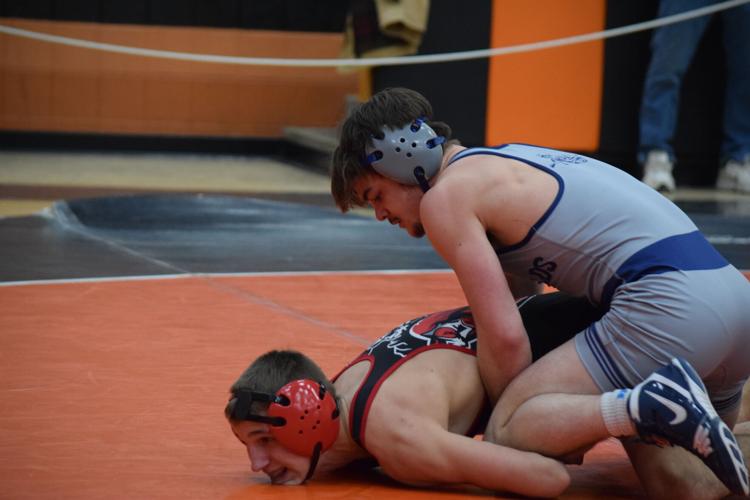 Reynolds dominates as they claim 22nd District 10 team wrestling title ...