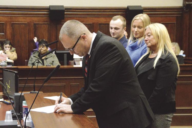 County officials thank family as they're sworn in | News ...