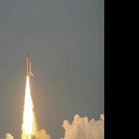 Shuttle returns home with all hands, including Beaumont's Tracy ...