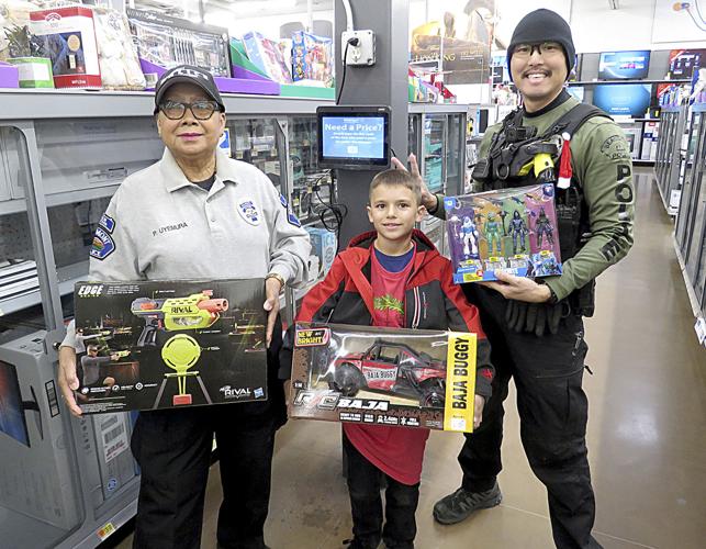 Community receives Shop with a Cop convoy with cheers and waves ...