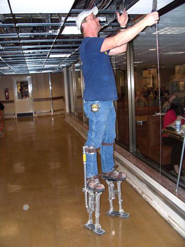 Elkview man uses stilts to touch up ceilings, tiles | Local News ...