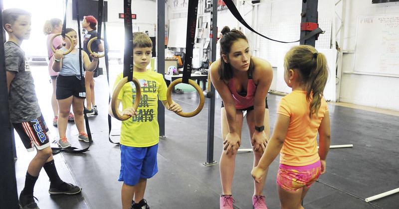 Ex-cheerleader turns CrossFit queen | News | register-herald.com