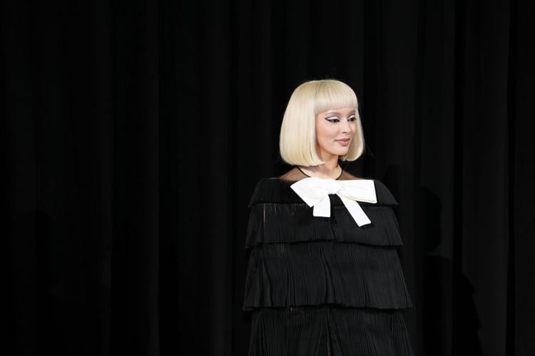 Valentino opens post-Garavani couture with somber note, then high drama ...