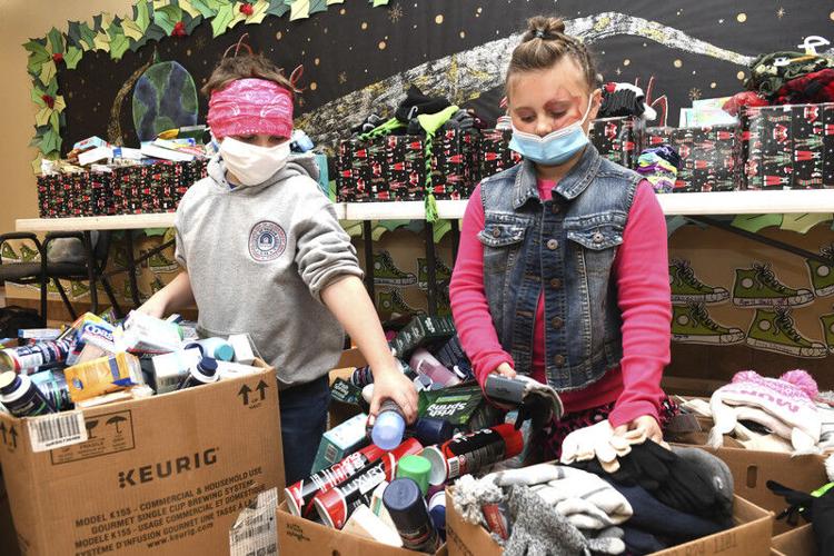 Students learn importance of giving | State & Region | register-herald.com