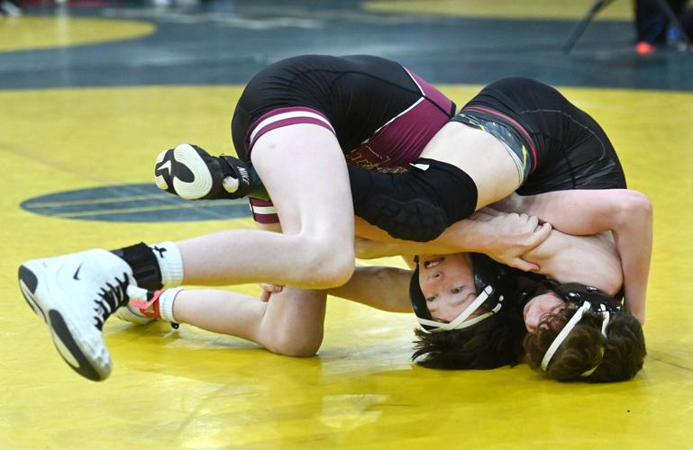 Prep wrestling: Big wins put freshmen Jones, Truman in state finals ...