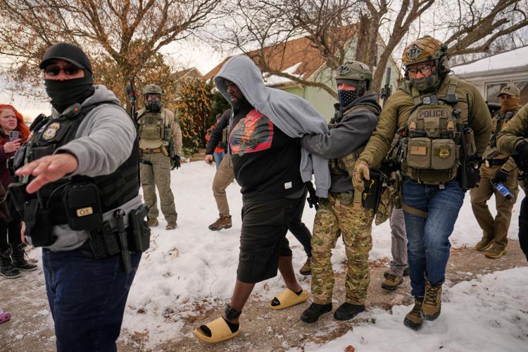 Immigration arrests and tense confrontations in Minneapolis, in photos ...