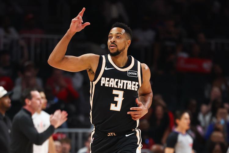 Hawks clinch a playoff spot and Southeast Division behind 29 points ...