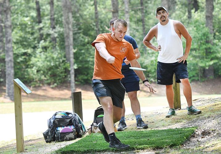 PHOTOS: Lake Stephens opens a new 18-hole disc golf course | News ...