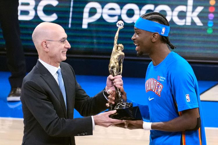 Shai Gilgeous-Alexander gets the MVP trophy from NBA Commissioner Adam ...