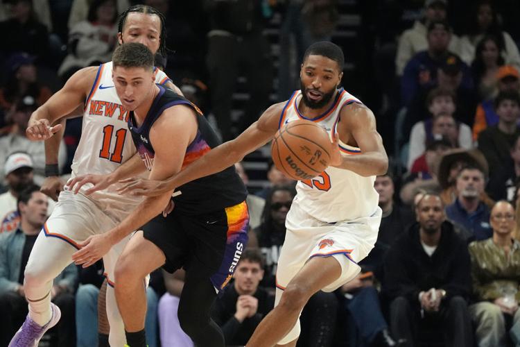 Booker scores 31 points, Brooks adds 27 as Suns hold on to beat Knicks 112-107 | National Sports ...