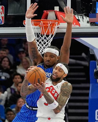 Bane leads Magic's rally in fourth quarter to beat Raptors 130-120 ...