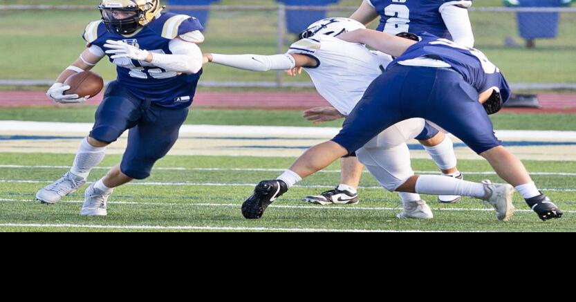 Tigers overcome Grizzlies for first win | Sports | register-herald.com