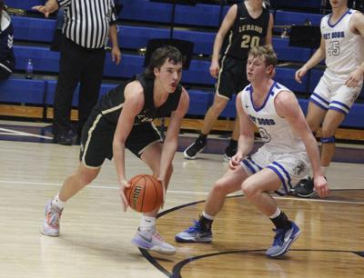 Tigers pull away from Hot Dogs to get conference win | Sports ...