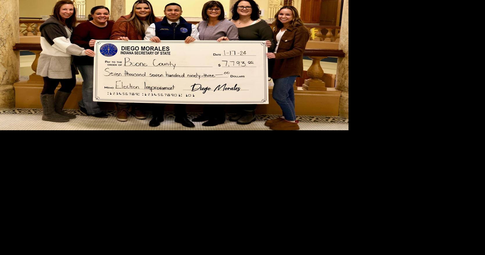 Secretary of State delivers check to Boone County Clerk | Local News ...