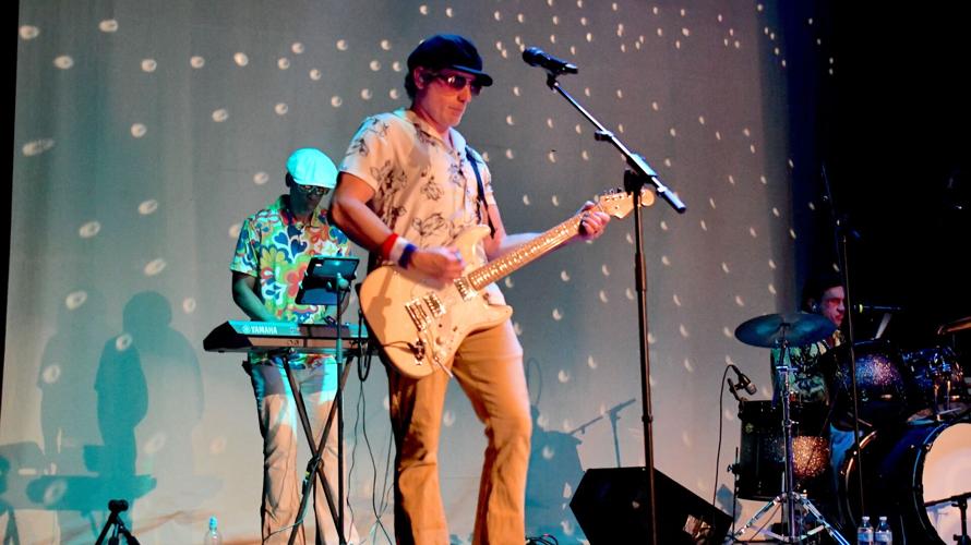 Trip down memory lane via car show, fashion show and 70s tribute band ...