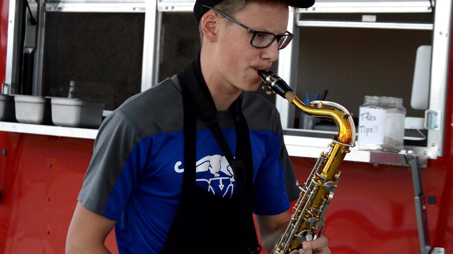 T-Rex Hamburger employee practices saxophone on breaks | News ...