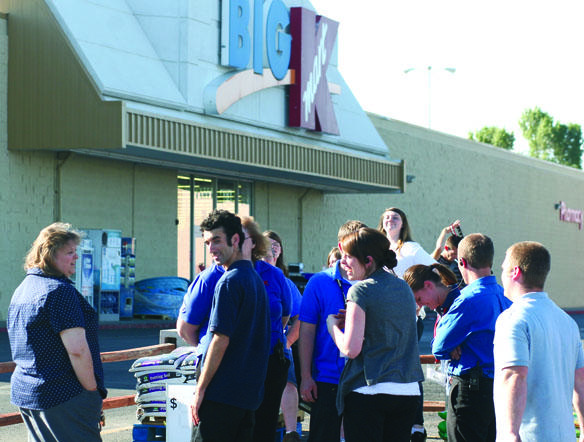 Kmart employees wait outside | | rexburgstandardjournal.com
