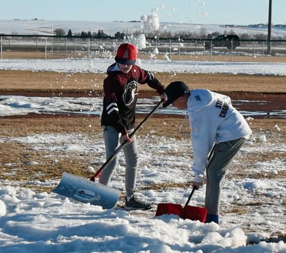 Diggers baseball team trades bats for snow shovels ...
