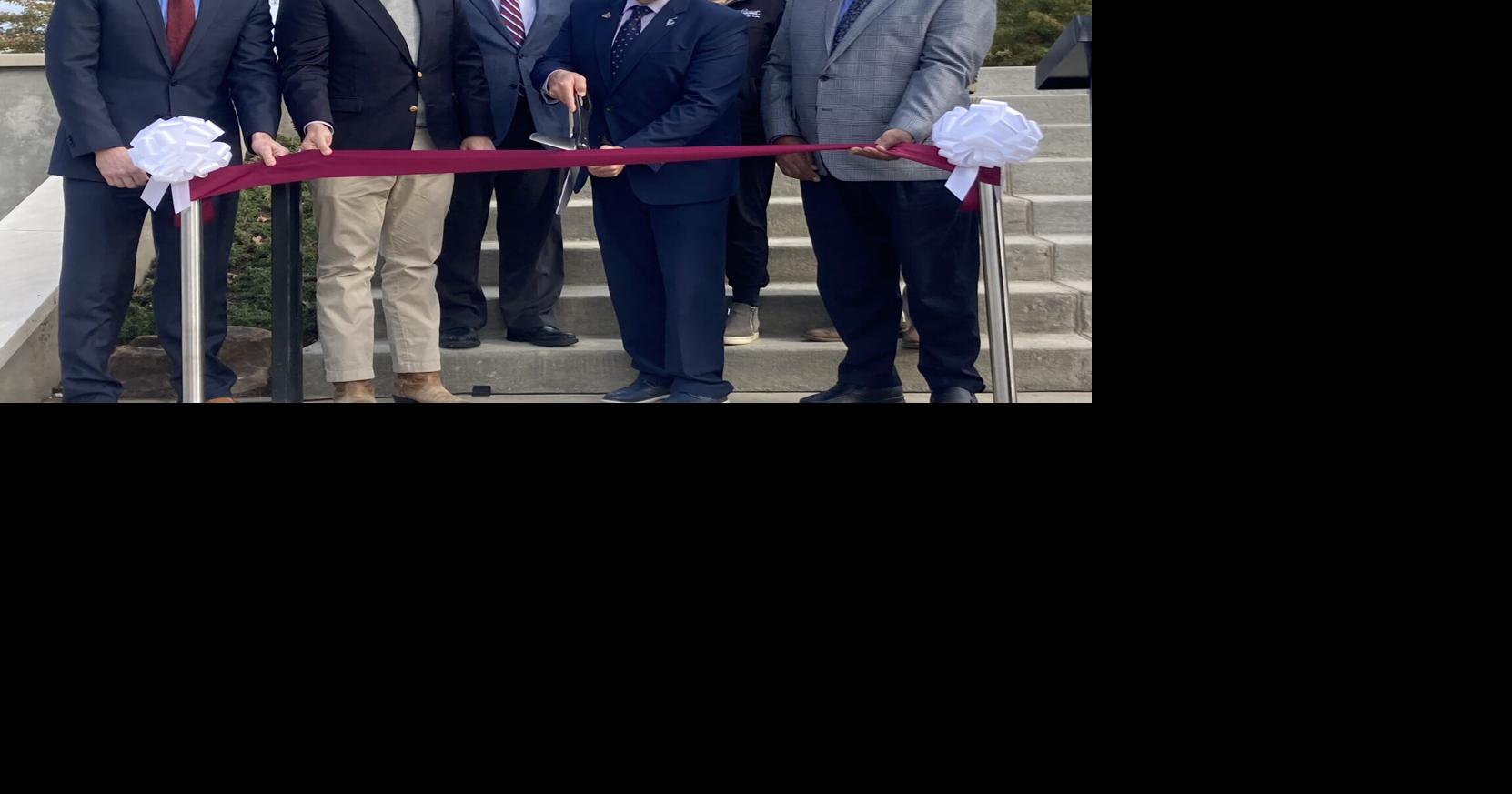 The ribbon is cut to the Veterans Memorial Site at Carloftis Garden ...
