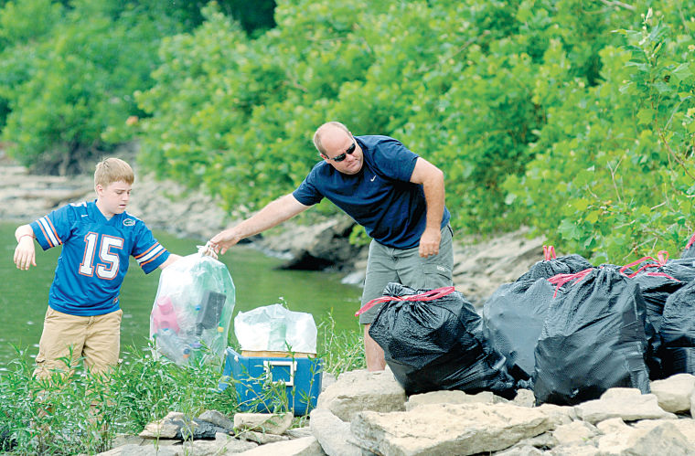 Volunteers net trash to preserve treasure | Local News ...