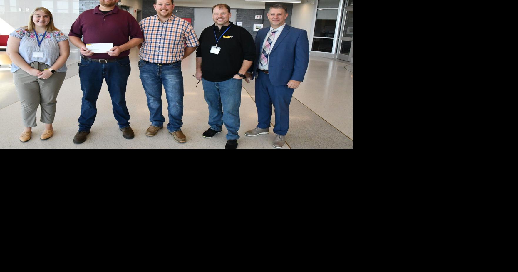 Education Notebook: Boyd Cat presents check to Ignite North | Education ...