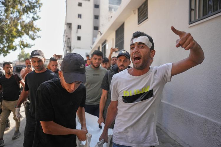 An Israeli strike hits a Gaza City apartment, killing 2 children ...