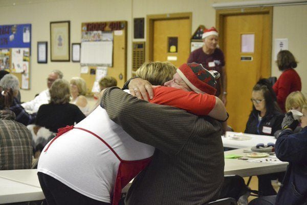 Helping hands: Volunteers make Christmas Eve dinner possible ...