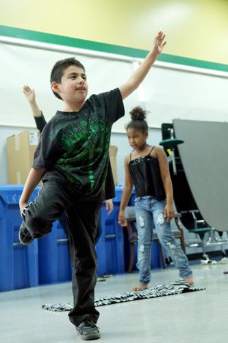 Students learn yoga at YMCA’s spring break camp | Local News ...