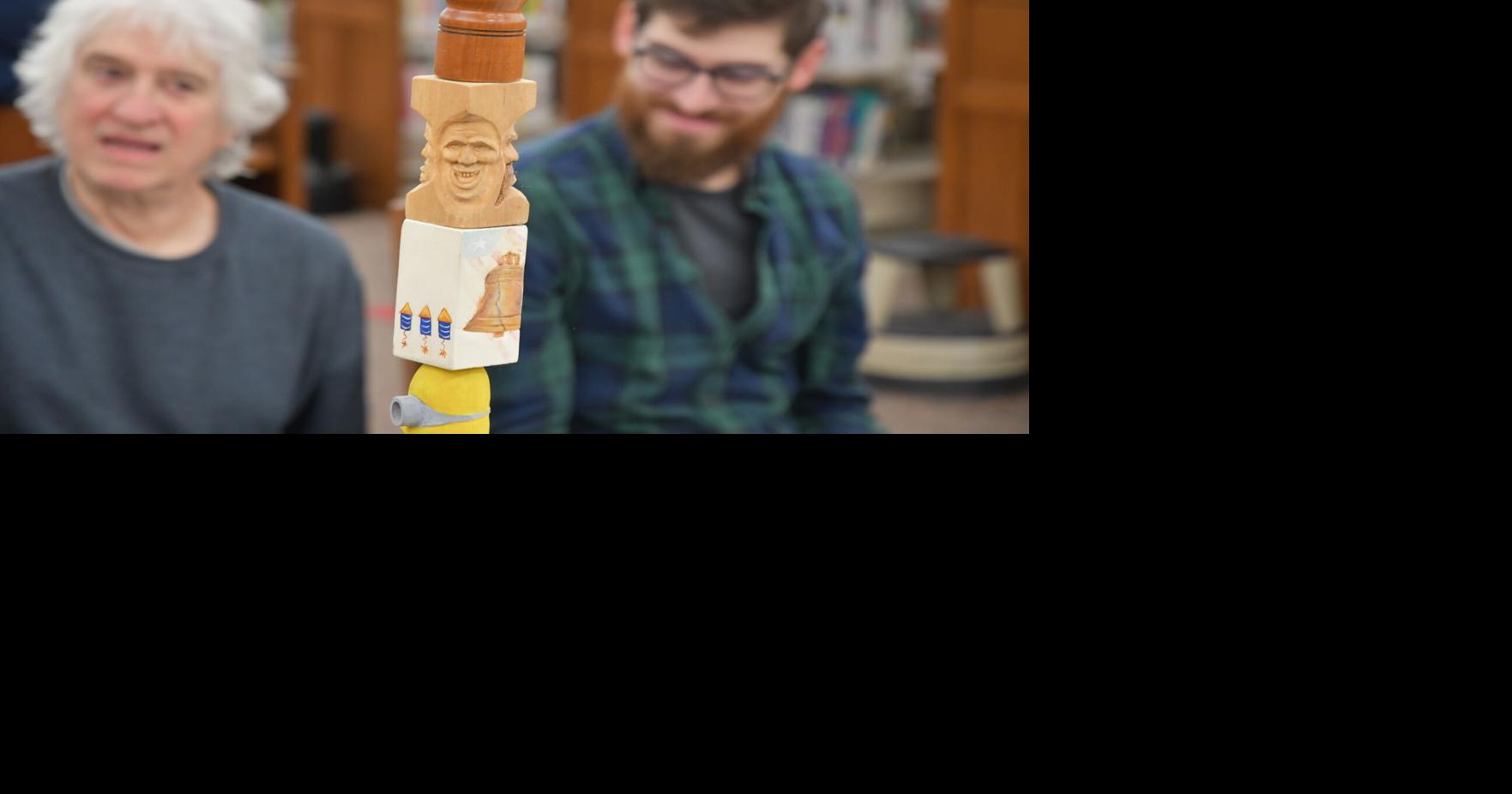 CARVING OUT A PLACE: Local woodcarving group donates funds to library ...