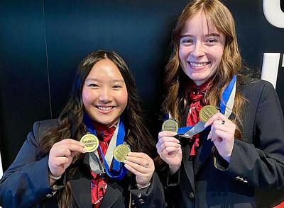 Pair of students from Gene Burton Academy rise near the top in DECA ...