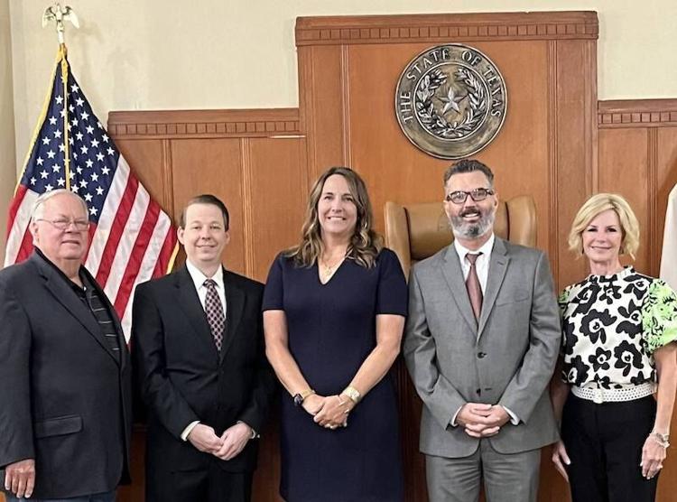 Commissioners honor Adams as county’s first female superintendent ...