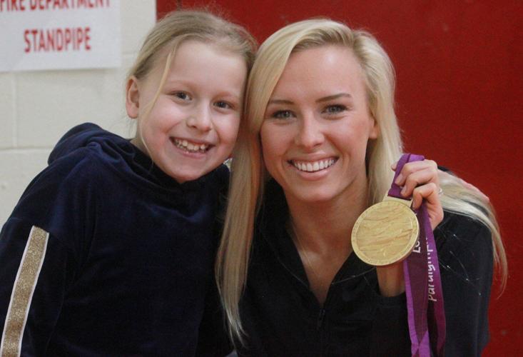 Swimmer shares story of determination, overcoming odds in visit to ...