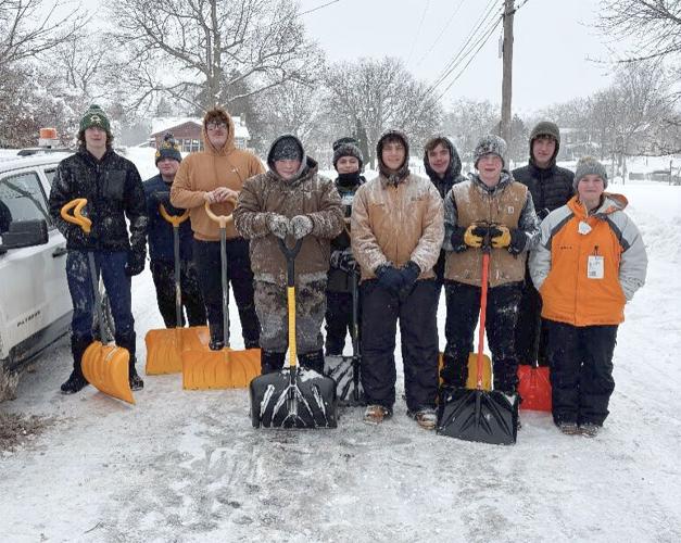 VVS football players help neighbors in Operation Snow Devil | News ...