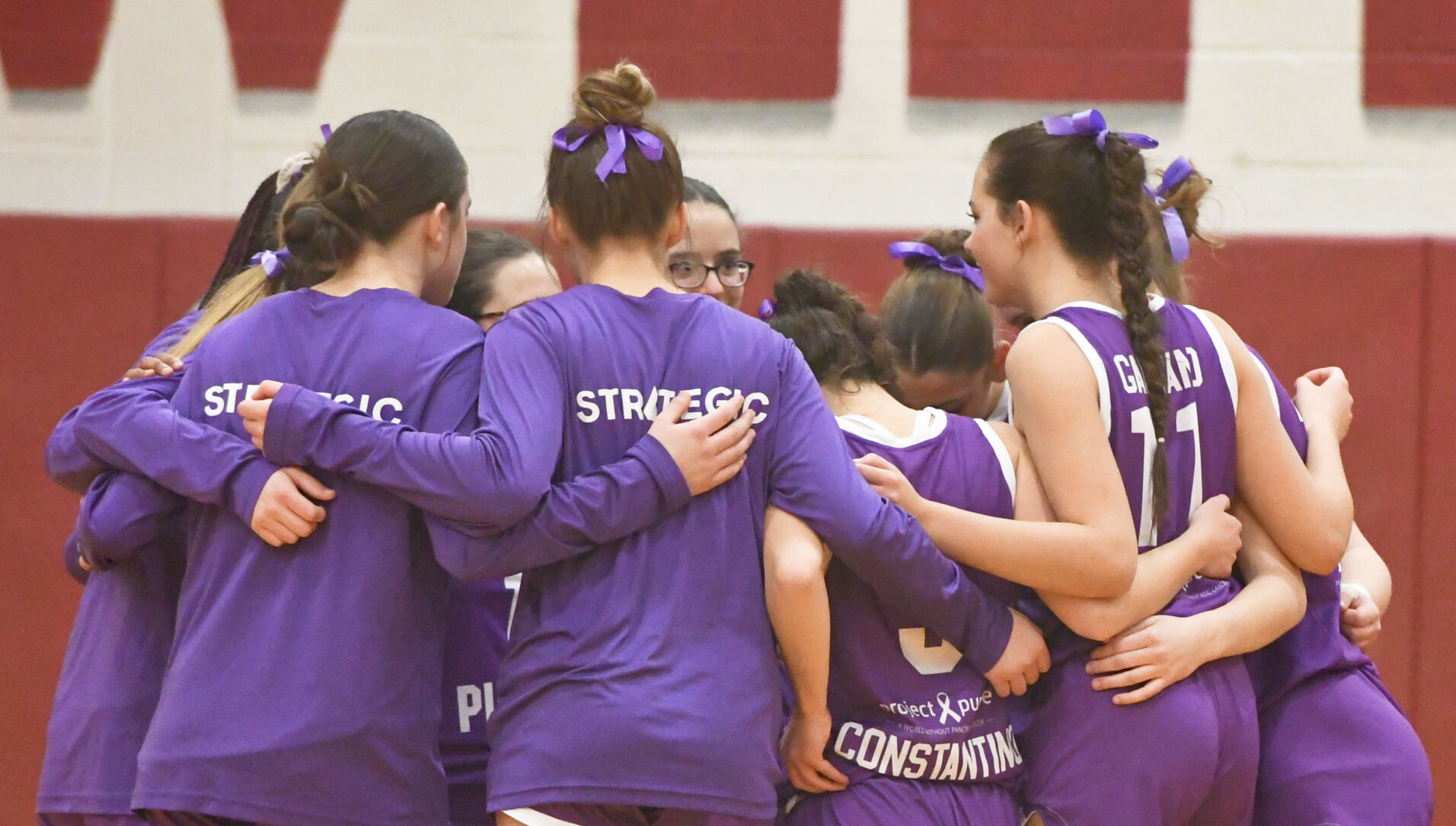 Clinton basketball teams honor late coach, father with Project Purple ...
