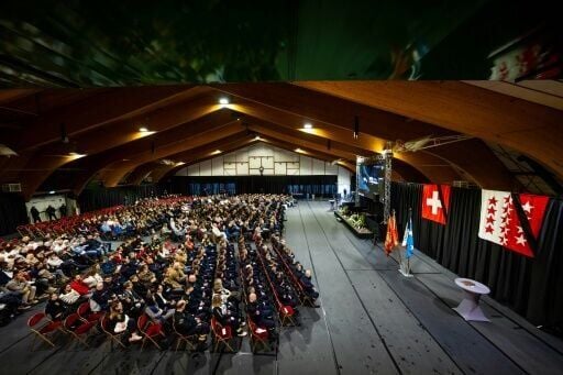 40 white roses: shaken mourners remember Swiss fire victims | News ...